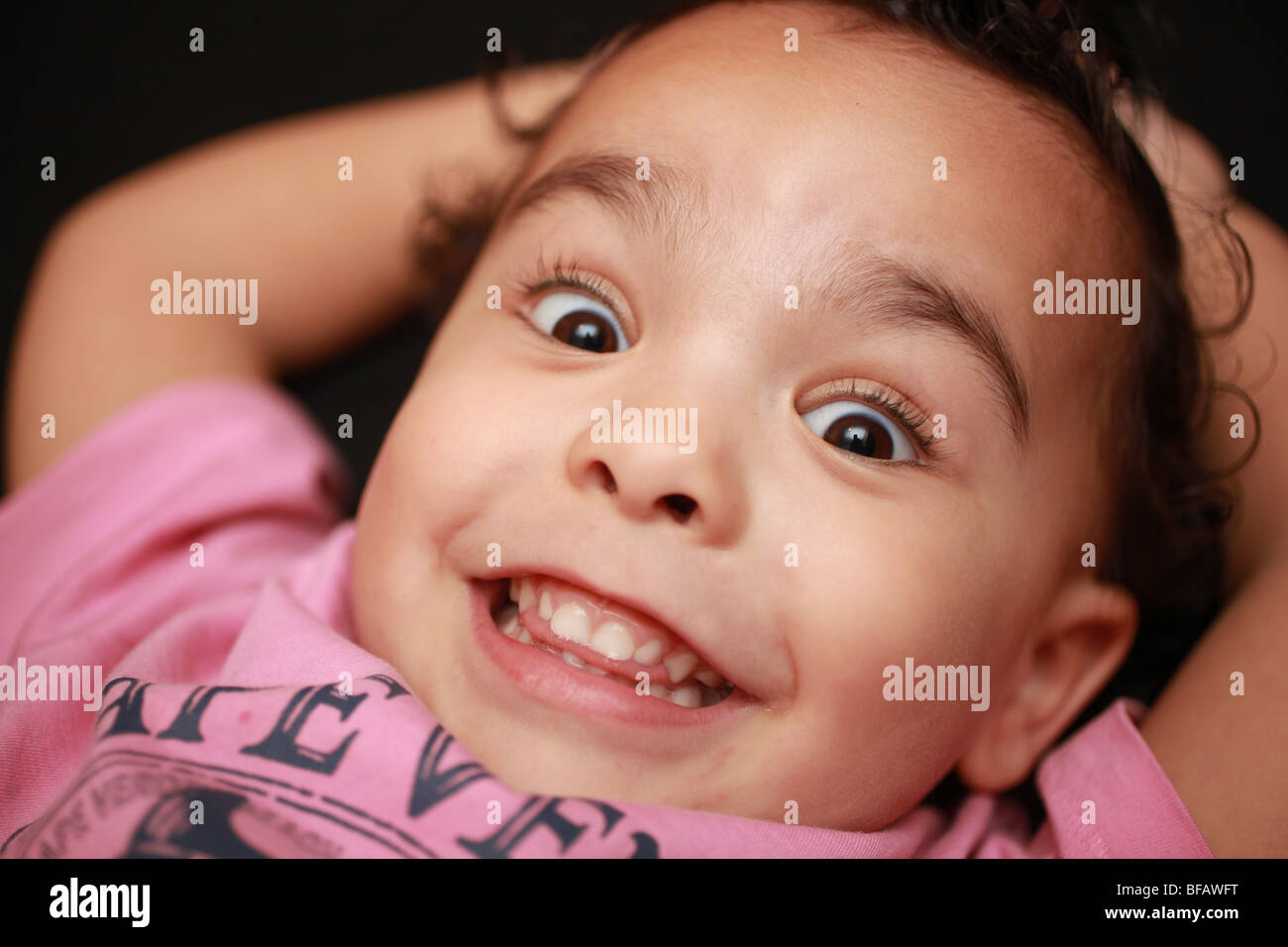 Child smiling at camera Stock Photo - Alamy