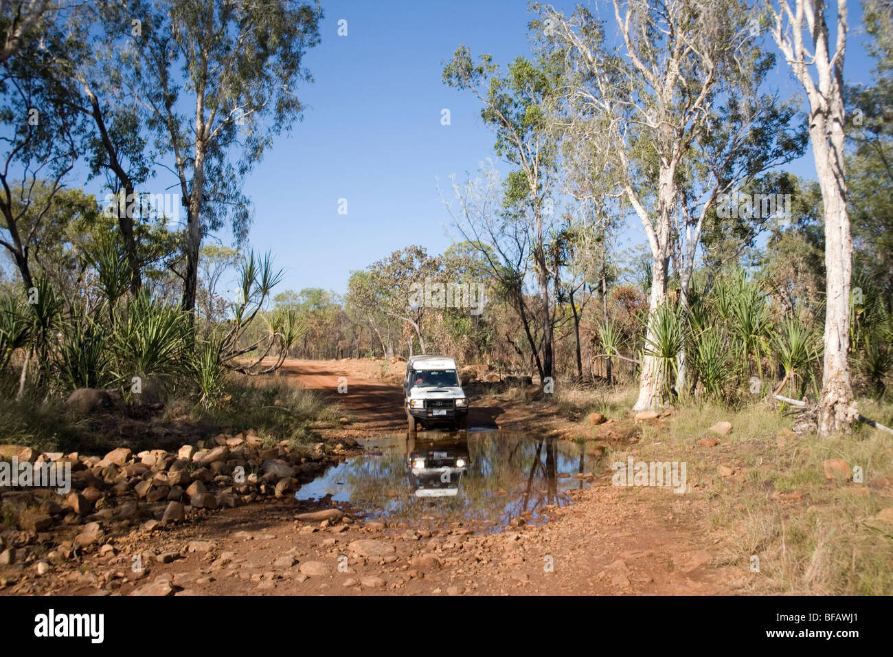 Camper van crossing creek on the Gibb River Road – former drovers track ...