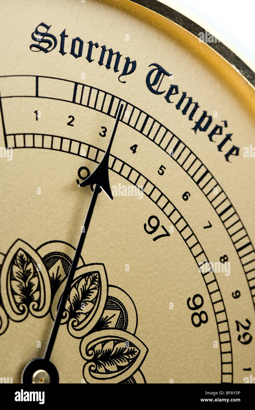 Old barometer forecasting stormy weather Stock Photo - Alamy