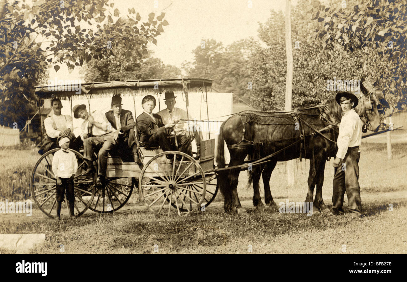 Group of Five Men in Horse Drawn Carriage on Outing Stock Photo - Alamy