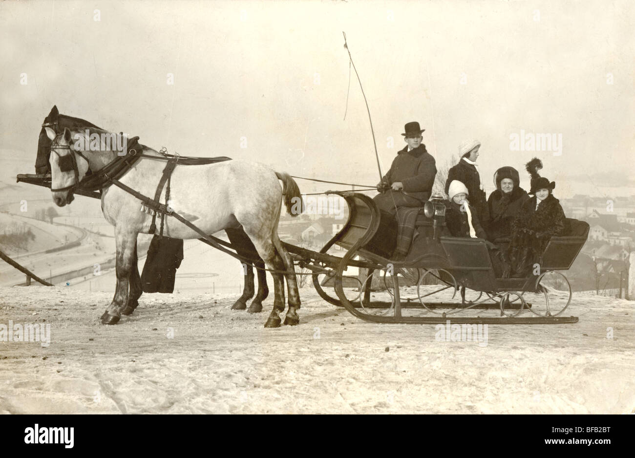 Five People Riding in Horse Drawn Sleigh Stock Photo - Alamy