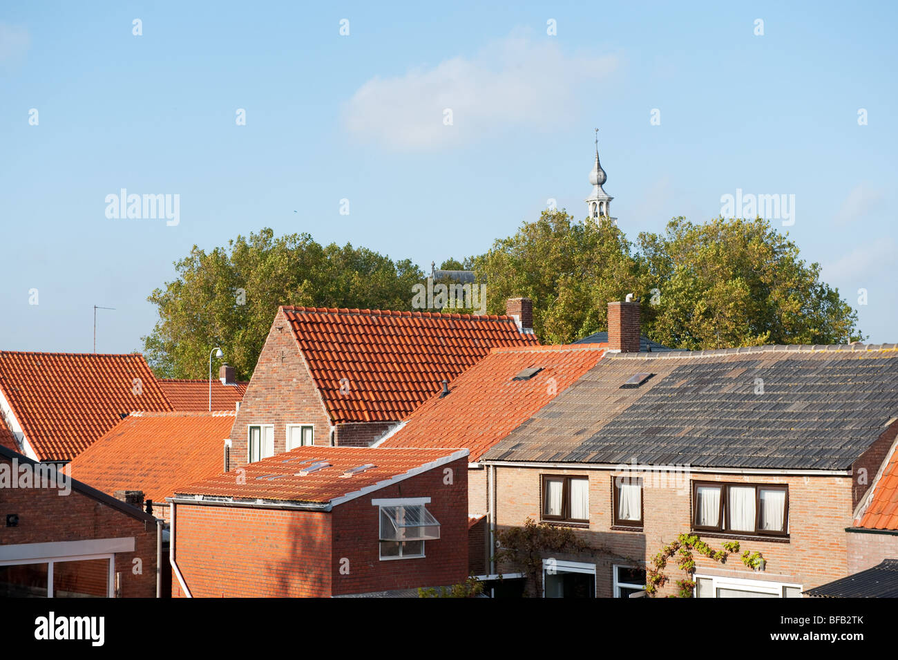 Dutch municipality IJzendijke with little church tower Stock Photo - Alamy