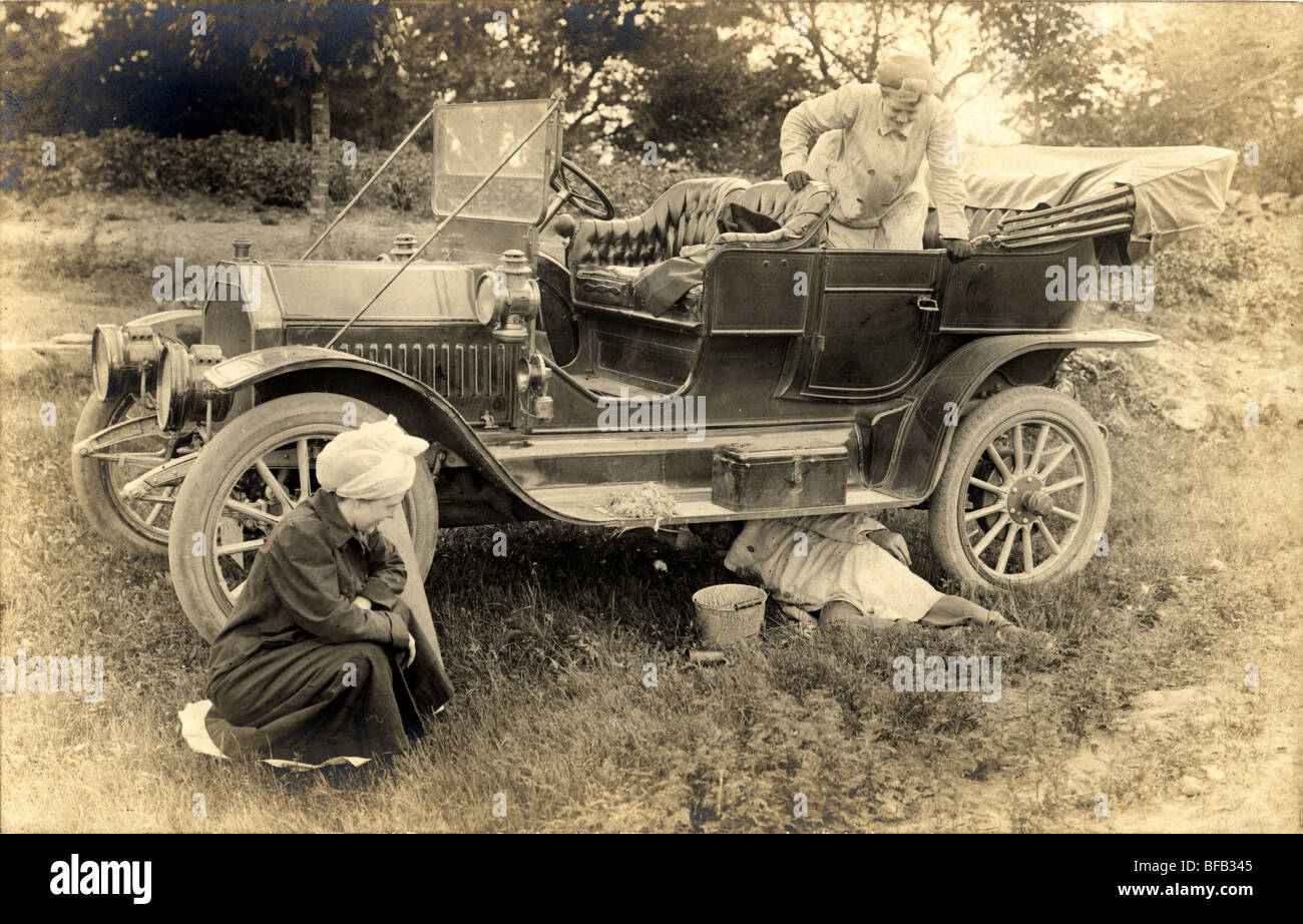 Woman repairing vintage car hi-res stock photography and images - Alamy