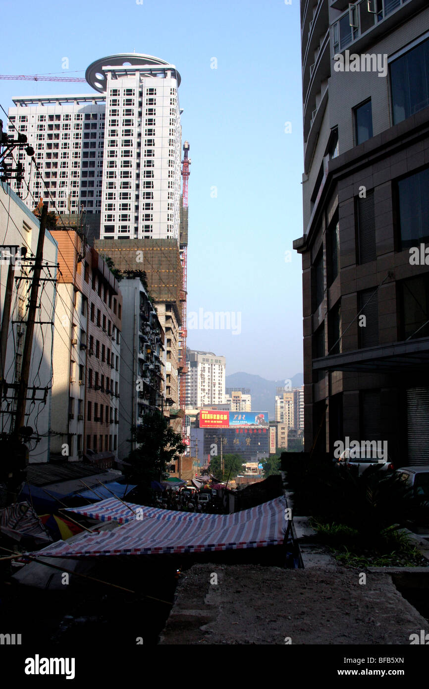 Busy back streets of Chongqing, China Stock Photo - Alamy