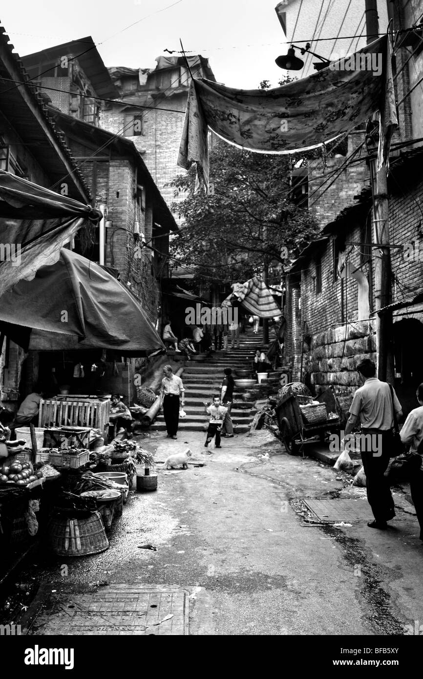 Busy back streets of Chongqing, China Stock Photo - Alamy