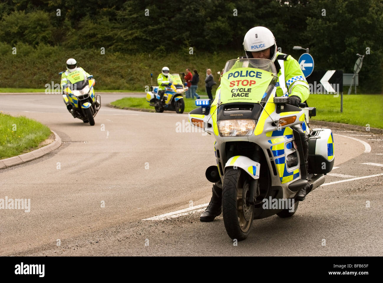 Police motorcyclists controlling traffic Stock Photo - Alamy