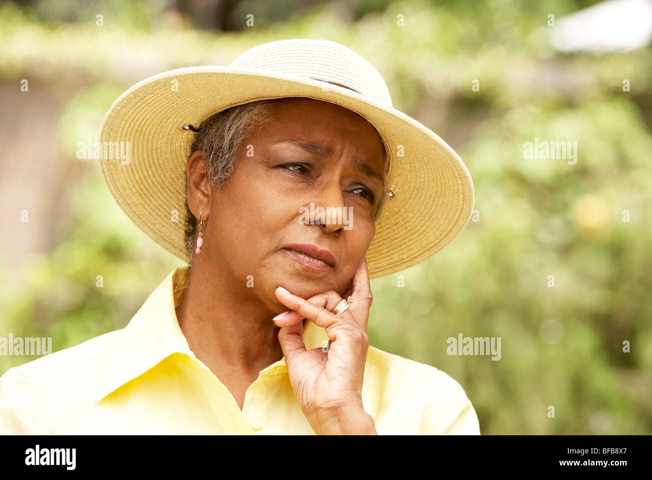 Senior Woman With Thoughtful Expression Stock Photo - Alamy