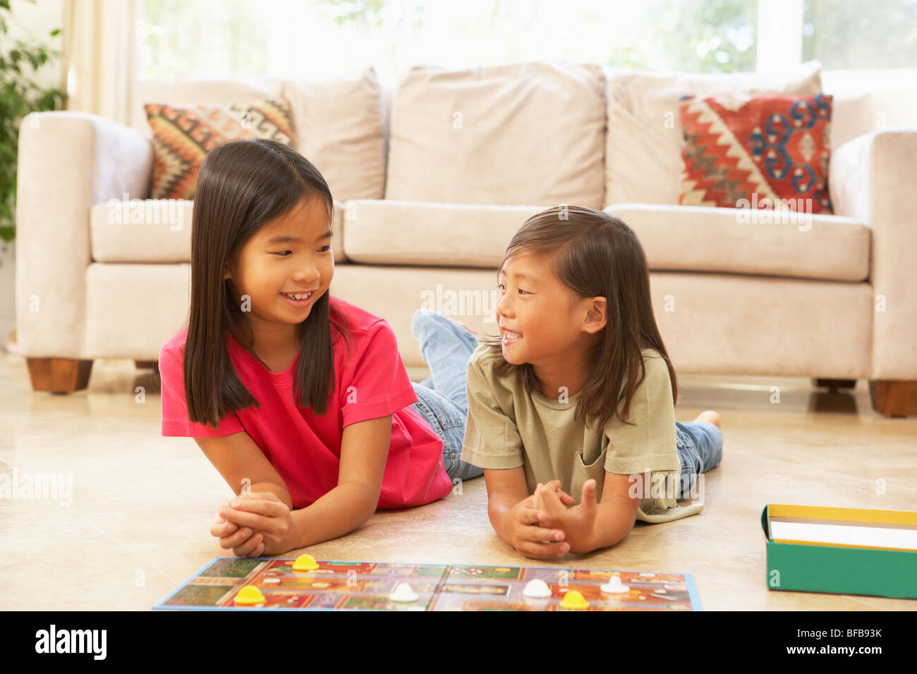 Two girls playing board game hi-res stock photography and images - Alamy