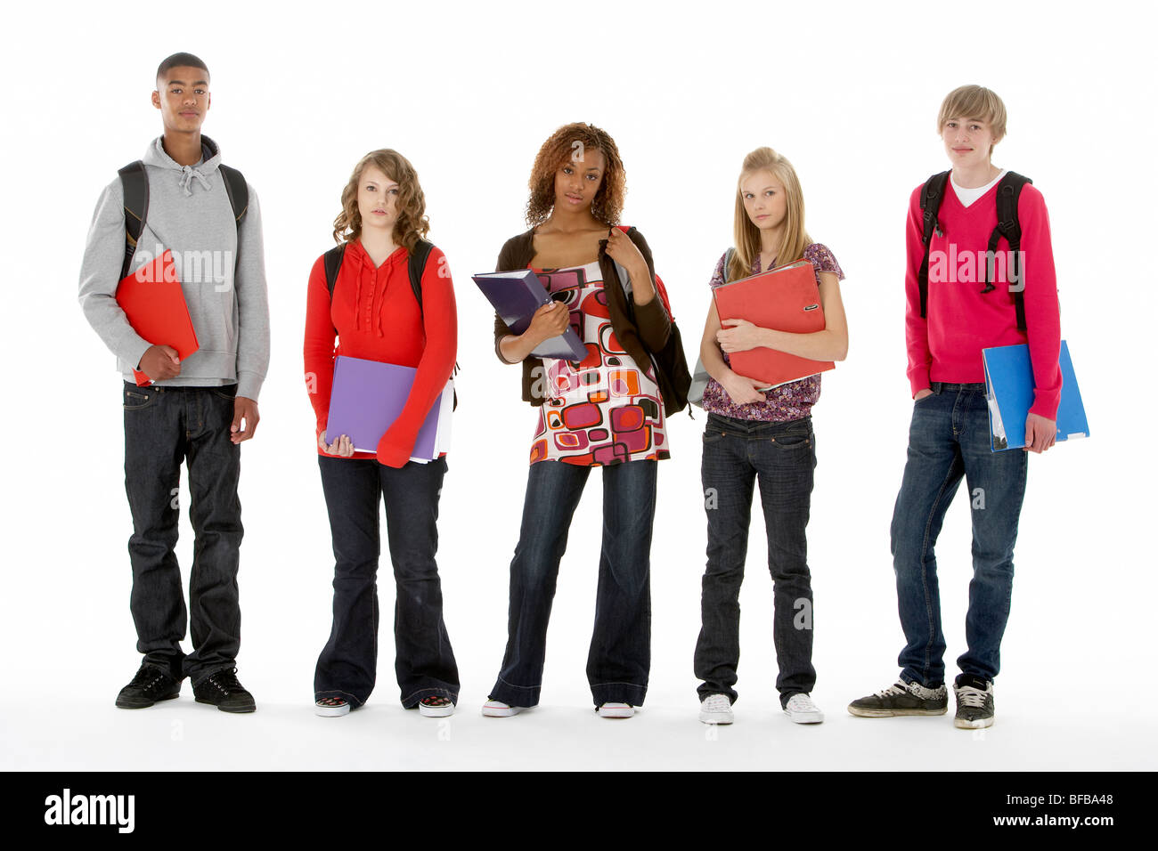 Full Length Studio Portrait Of Five Teenage Students Stock Photo - Alamy