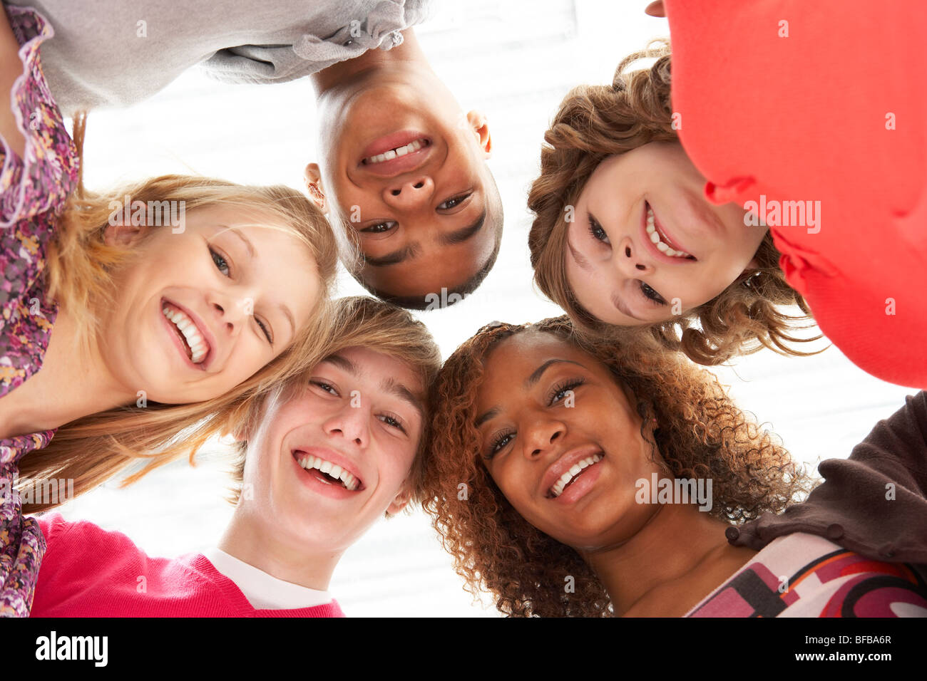 Five Teenage Friends Looking Down Into Camera Stock Photo - Alamy