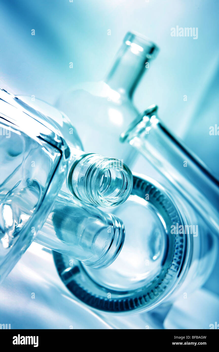 Abstract blue glass bottle in light closeup Stock Photo - Alamy