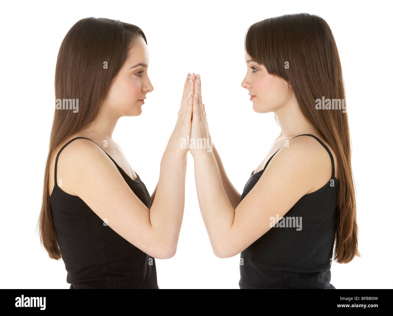 Studio Portrait Of Teenage Twins Stock Photo - Alamy