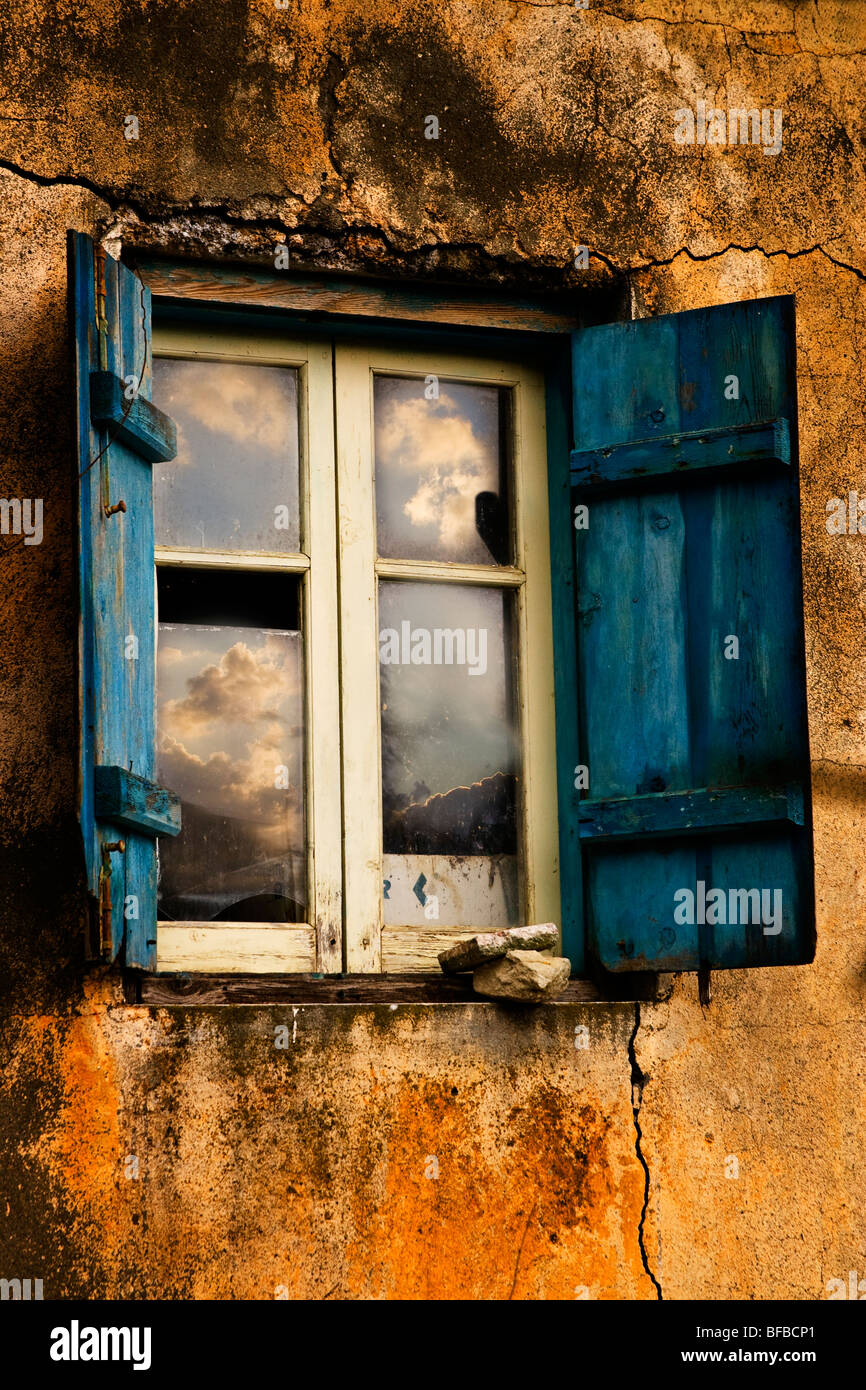 An open window and blue shutters, Mediterranean colours in Cyprus Stock ...