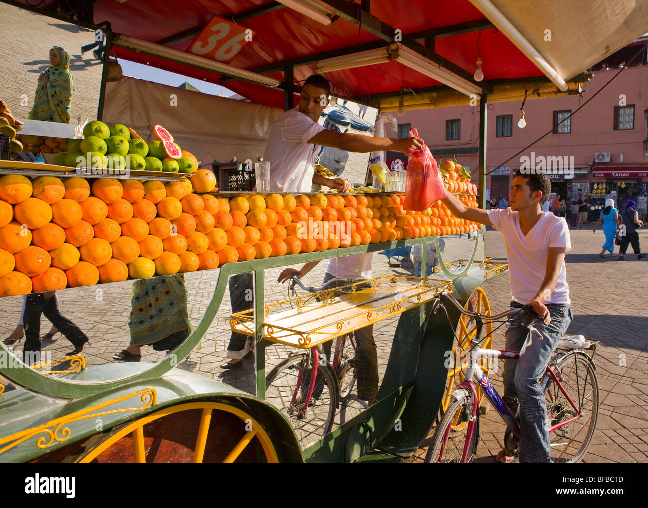 MARRAKESH, MOROCCO - Orange juice vendor in the Djemaa el-Fna main ...