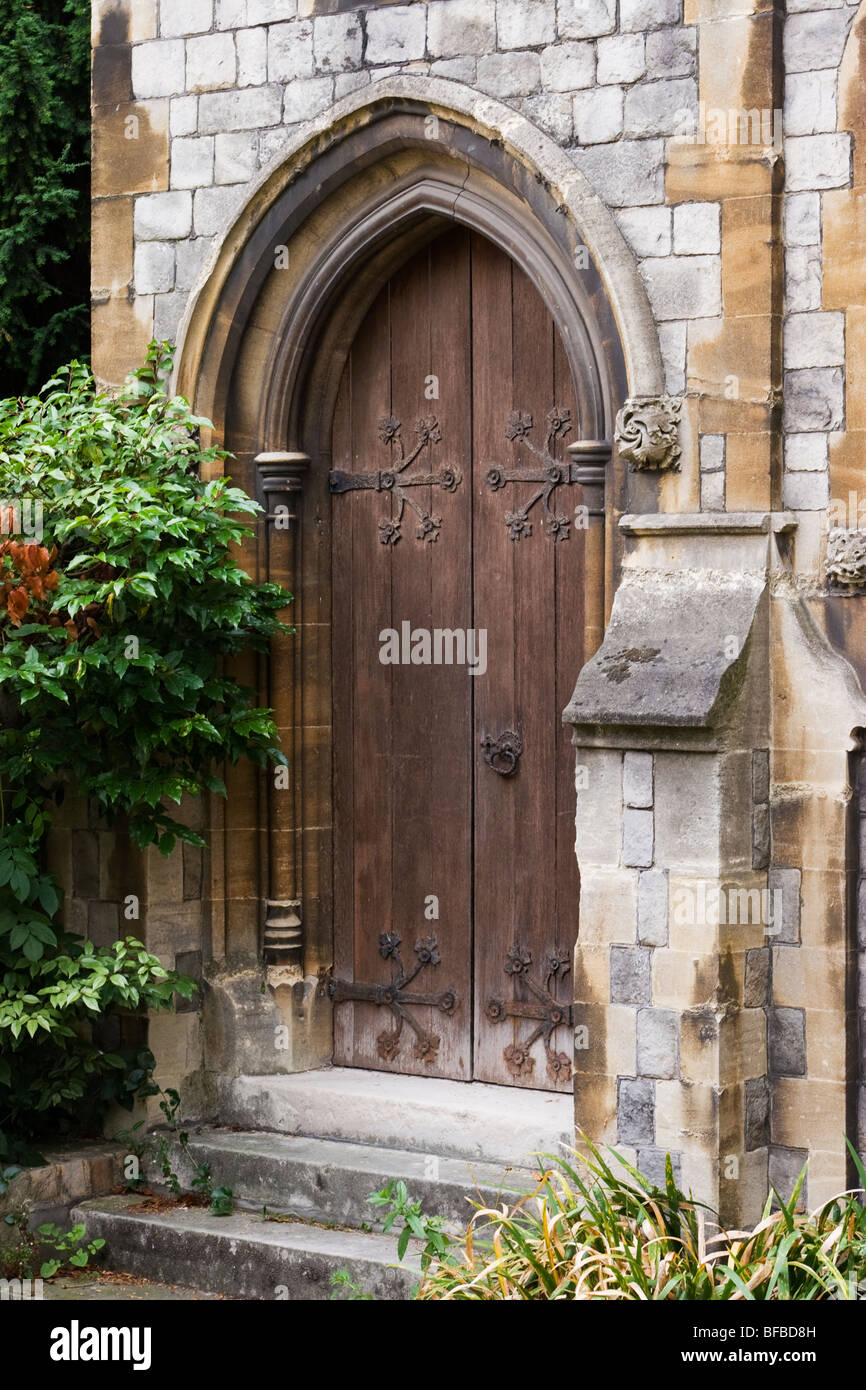 Gothic Arch wooden door to part of Eton college Stock Photo - Alamy