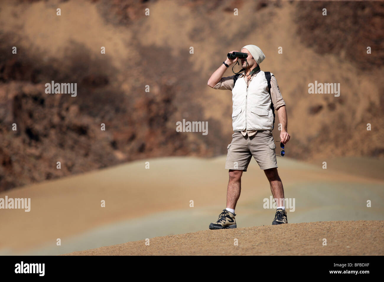 Man using his binoculars Stock Photo - Alamy