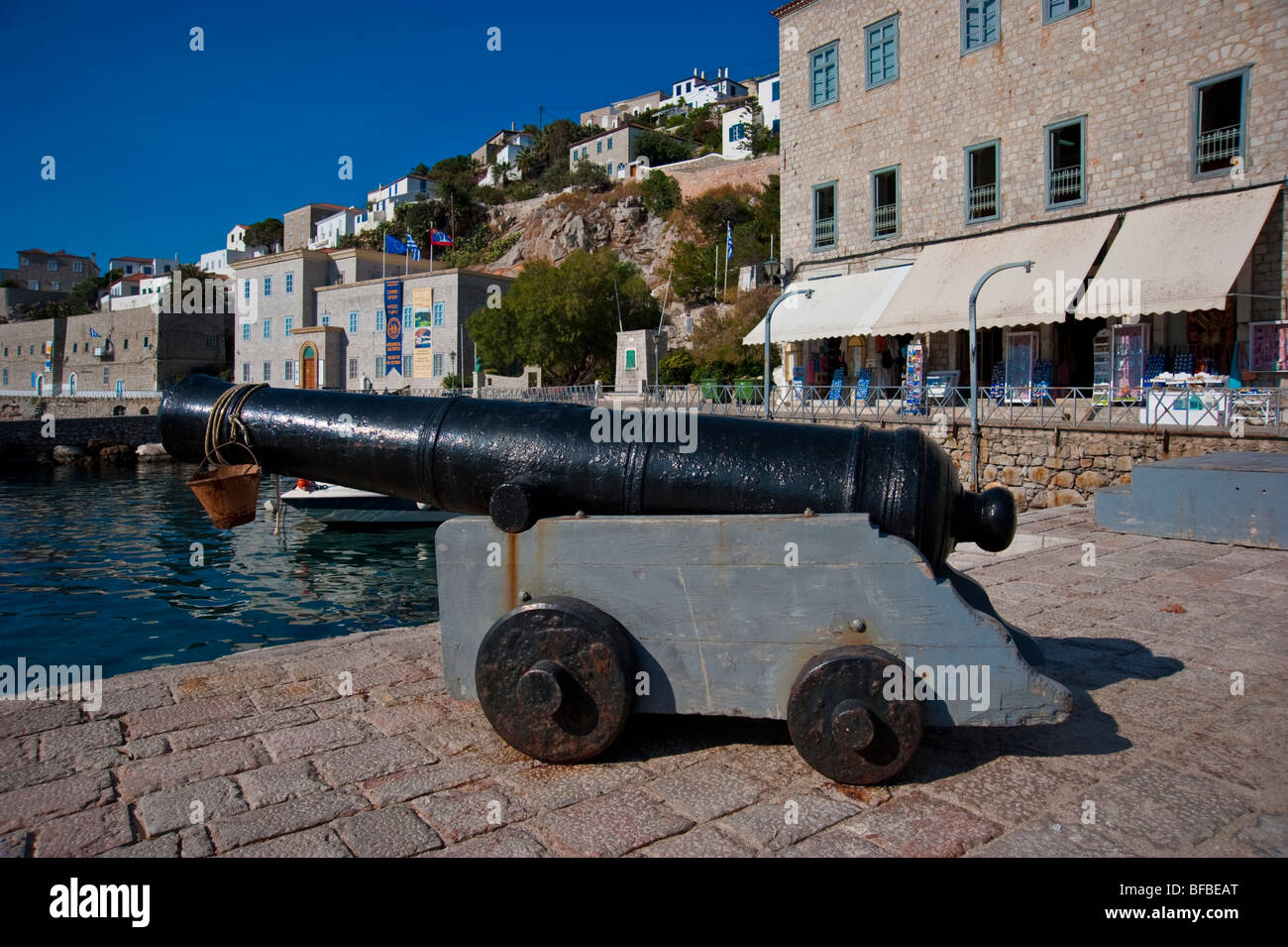 Cannon in front of buildings at Hydra island, Greece Stock Photo - Alamy