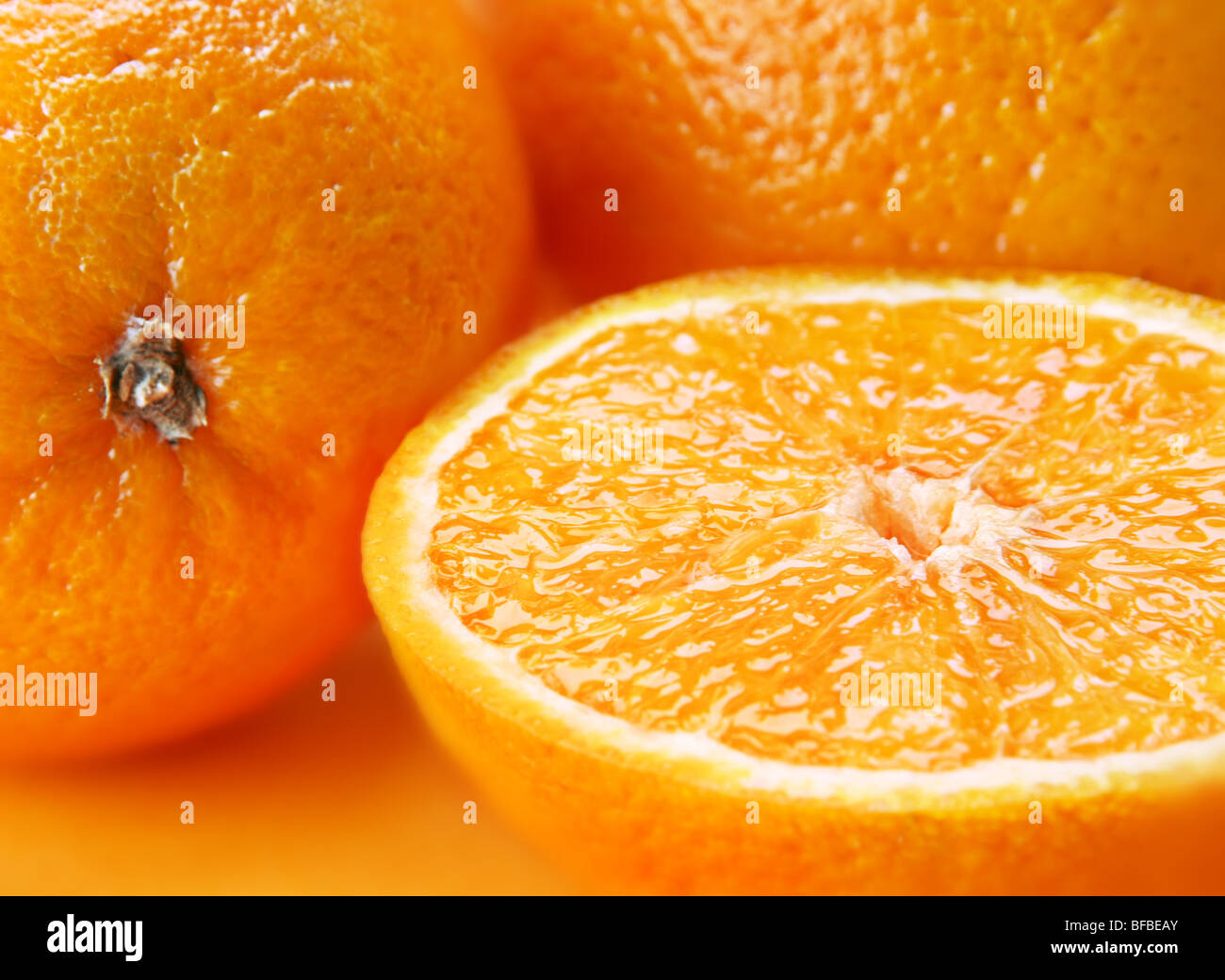 Citrus fruit orange with slice closeup Stock Photo - Alamy