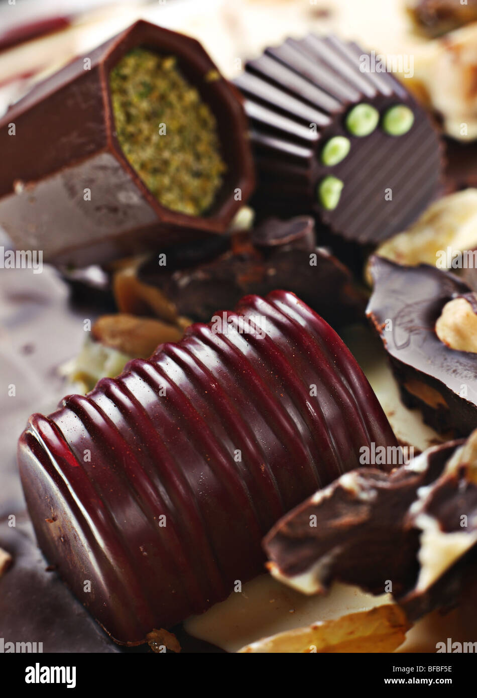 Chocolate candy group detail background with nut Stock Photo - Alamy