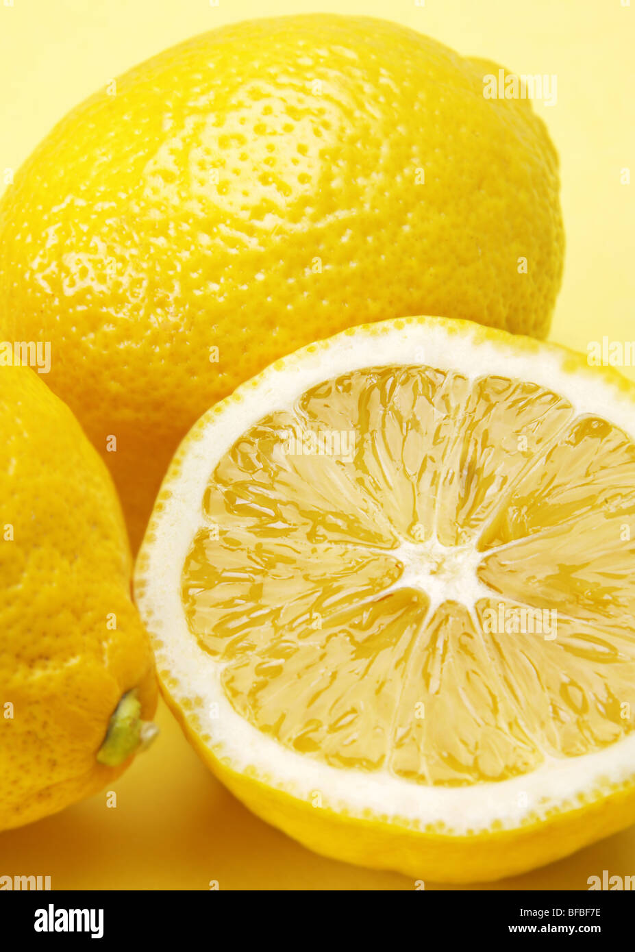Citrus fruit lemon on yellow background closeup Stock Photo - Alamy
