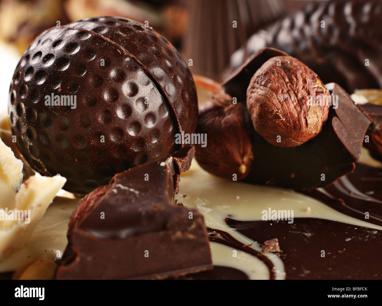 Chocolate candy group detail background with nut Stock Photo - Alamy