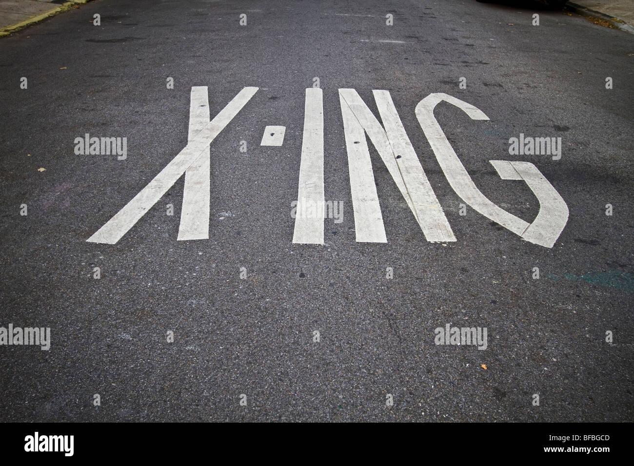 X-sing sign on the street road Stock Photo - Alamy