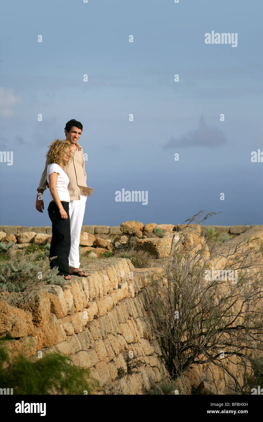 Young couple having a walk Stock Photo - Alamy