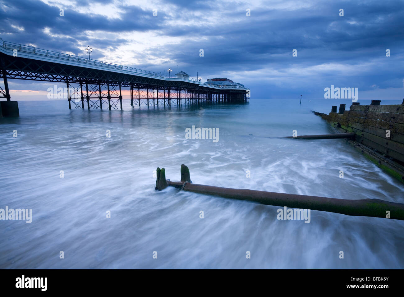 Cromer Pier with swirling sea water Stock Photo - Alamy