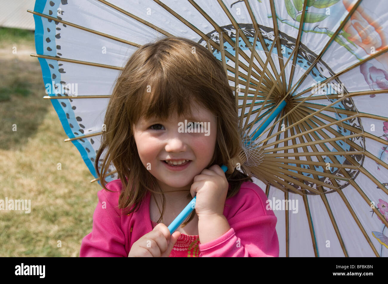 Girl parasol hi-res stock photography and images - Alamy
