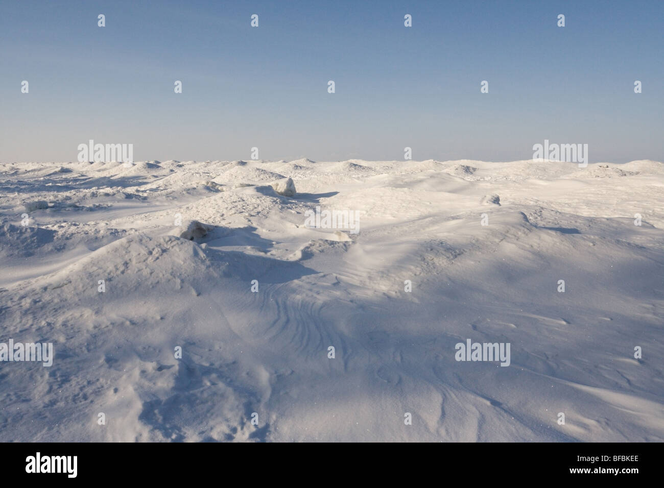Ice hummocks on the lake Baikal surface covered with snow Stock Photo ...