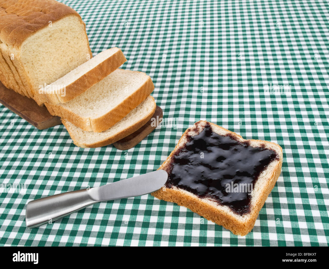 He spread the bread with jam hi-res stock photography and images - Alamy