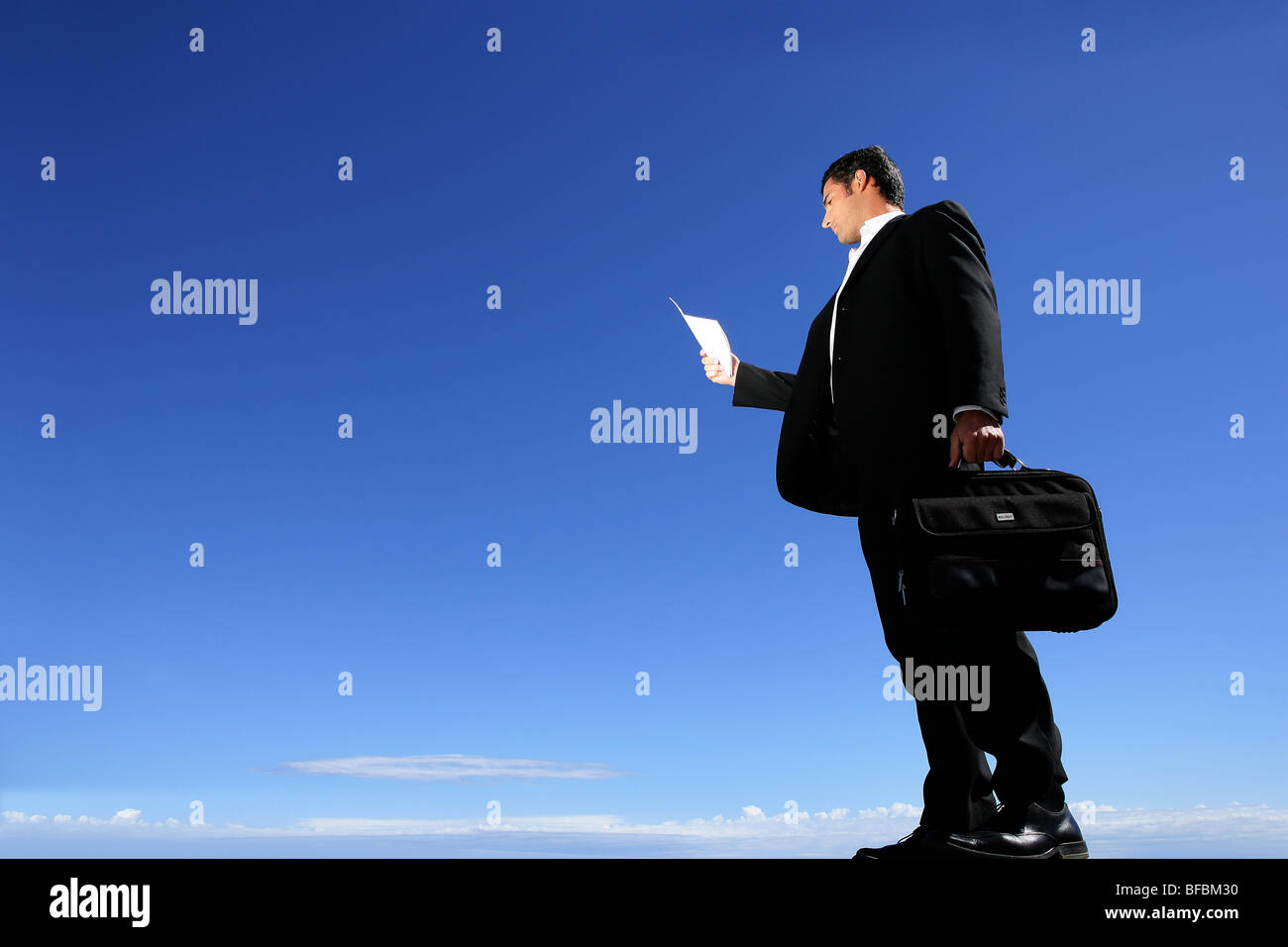 Businessman completely lost Stock Photo - Alamy