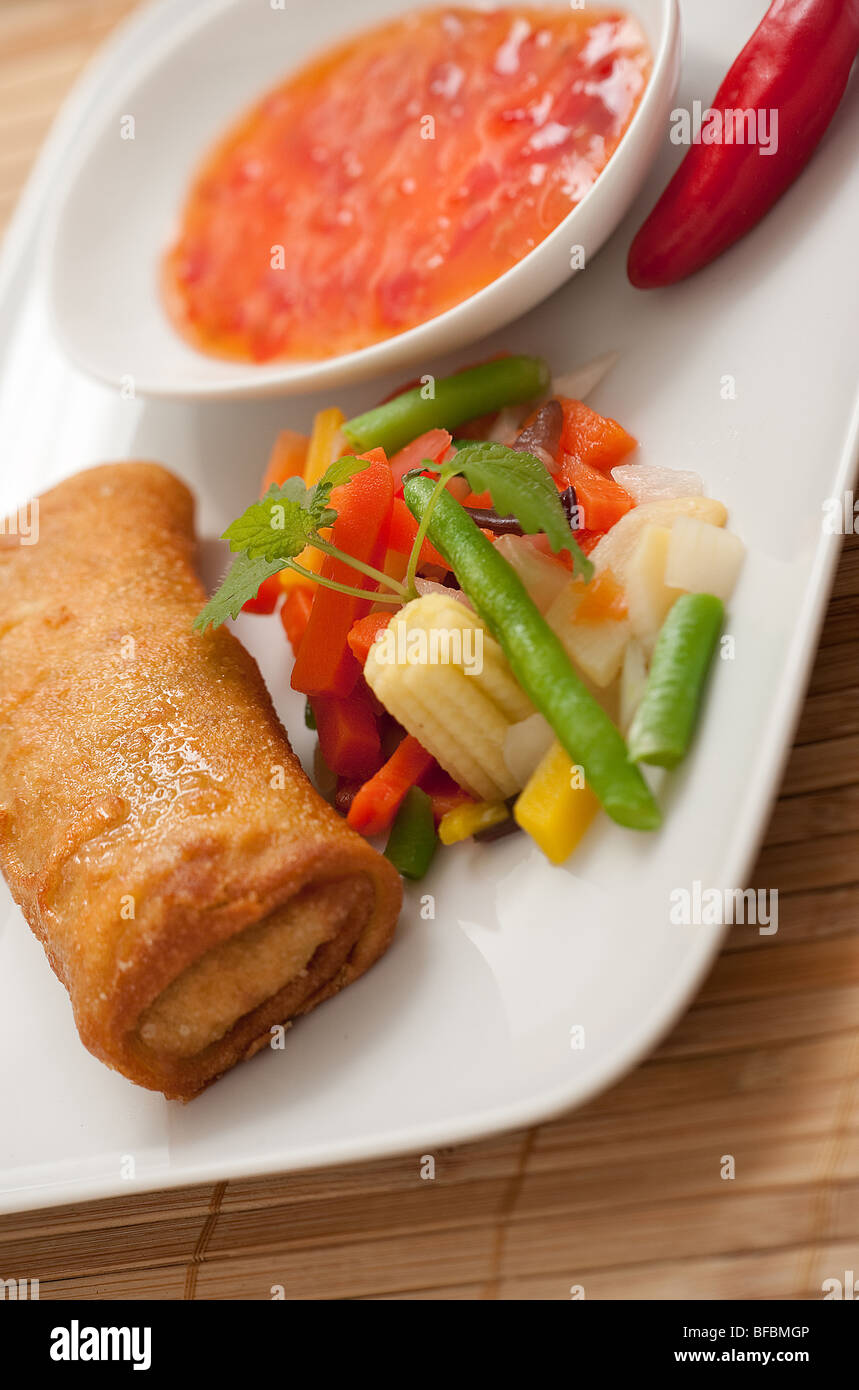 an asian spring roll and fresh vegetables Stock Photo - Alamy
