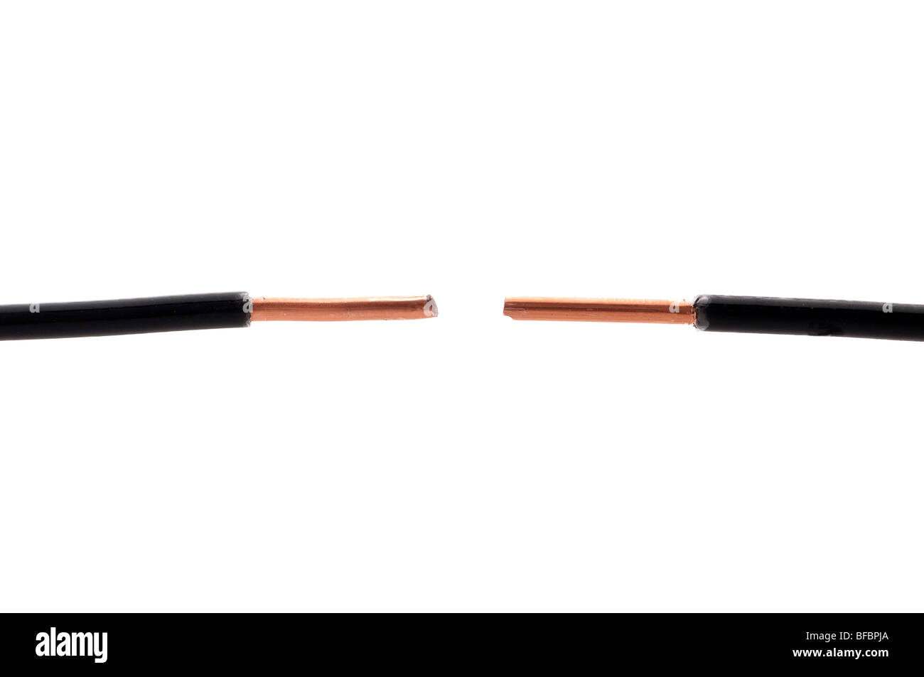 two ends of black wire facing each other on white Stock Photo - Alamy