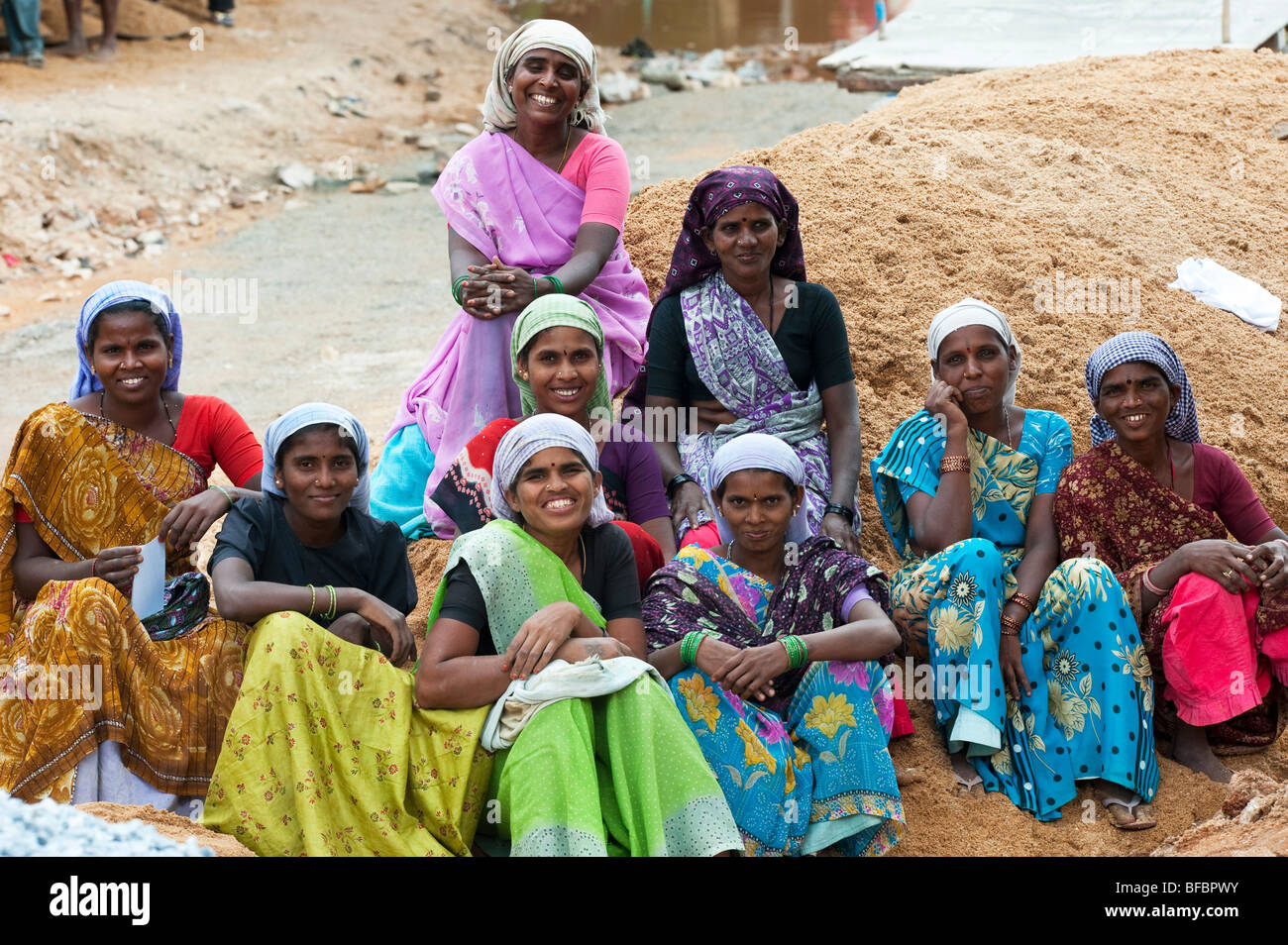 indian women working on the roads in Puttaparthi, Andhra Pradesh, India ...