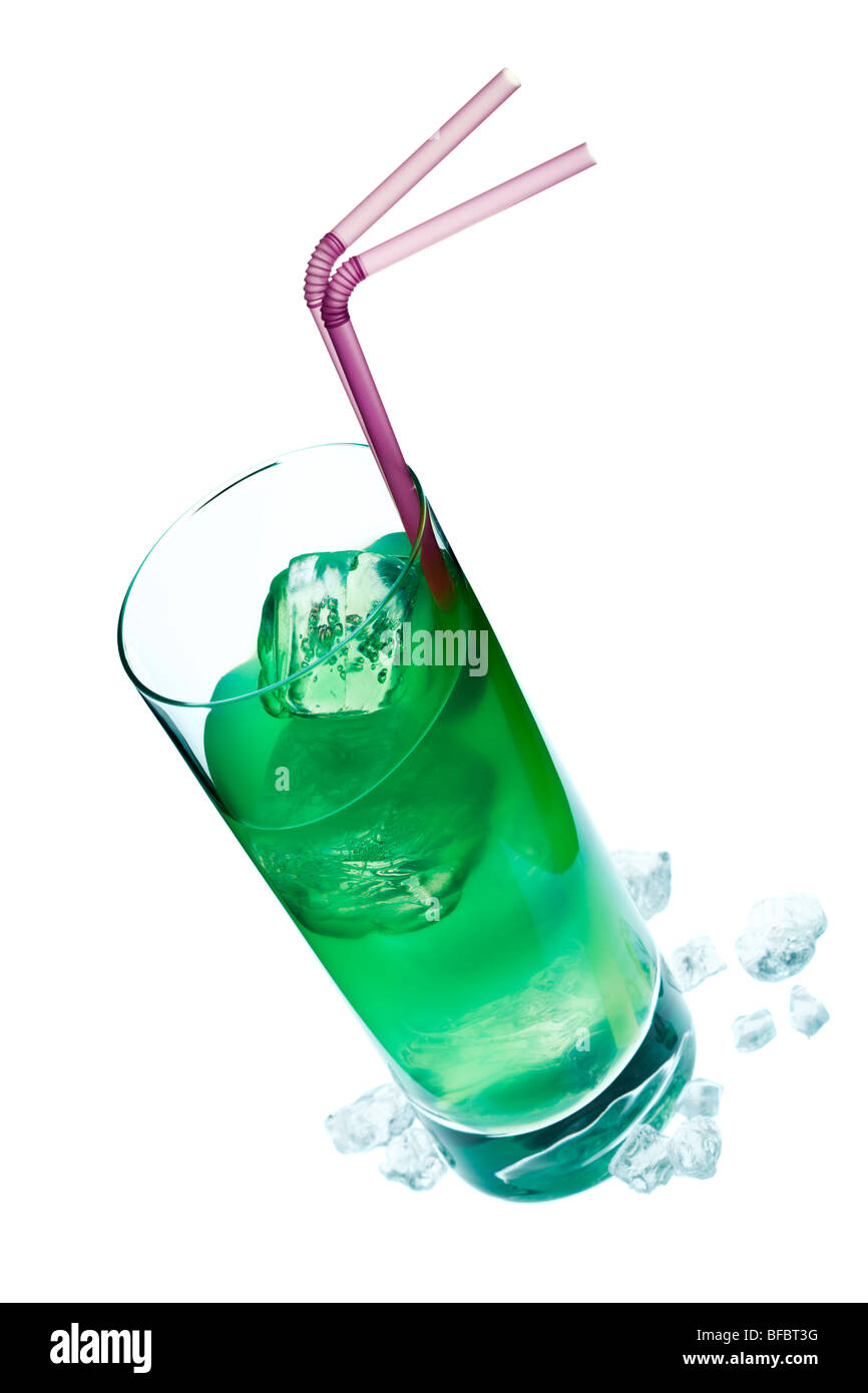 green coloured longdrink with ice cubes and purple drinking straws on ...