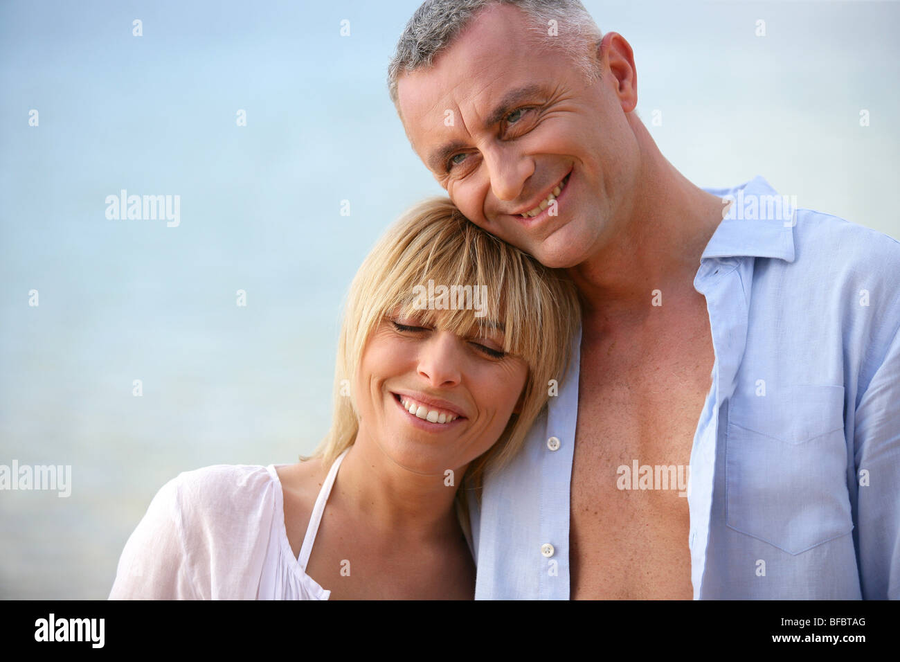 Relaxed couple in the summer Stock Photo - Alamy