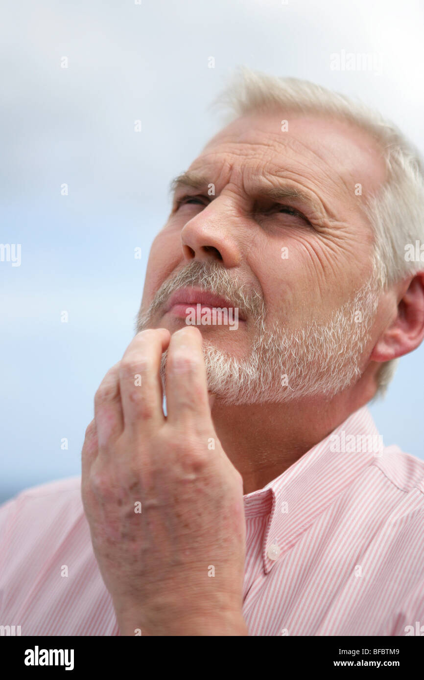senior man thinking Stock Photo - Alamy