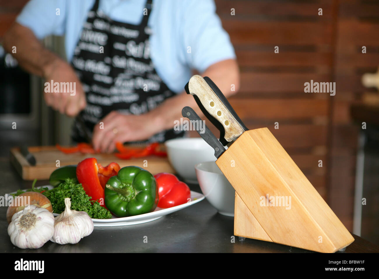 man cutting vegetables Stock Photo - Alamy