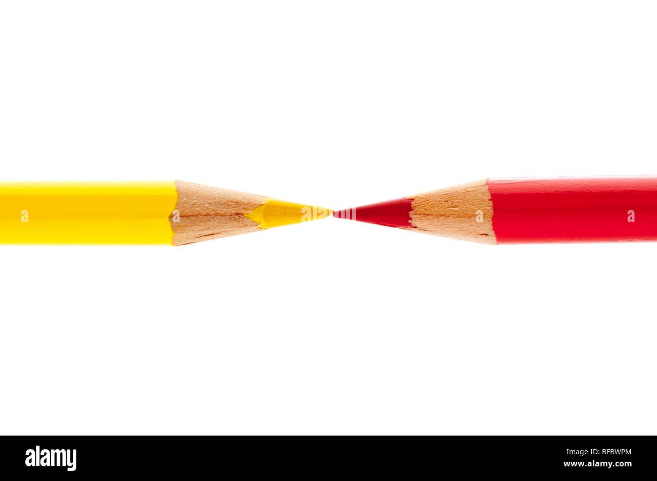 Brightly colored red and yellow pencils isolated Stock Photo - Alamy