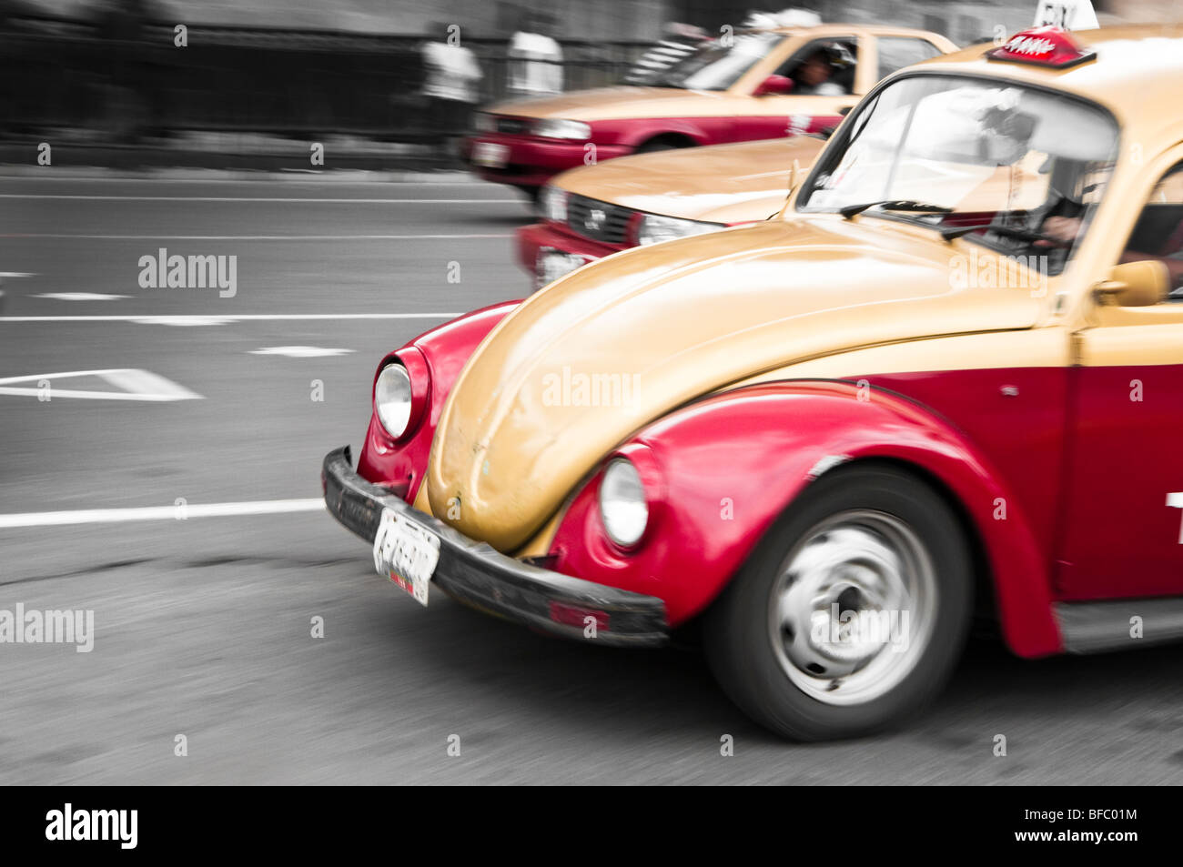 The traditional red and gold taxis of Mexico City Stock Photo - Alamy