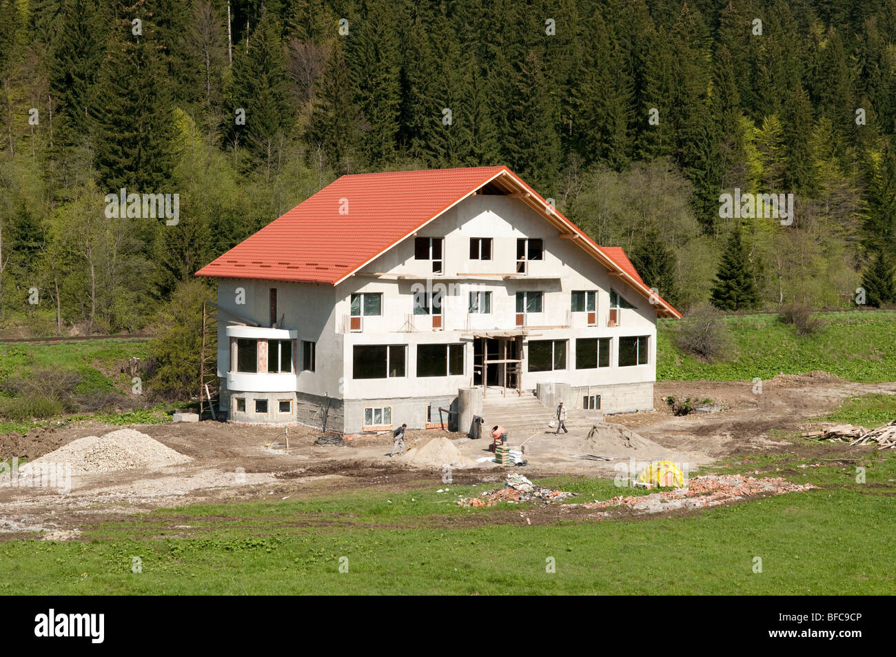 Modern Romanian house being constructed near forests near Brasov ...