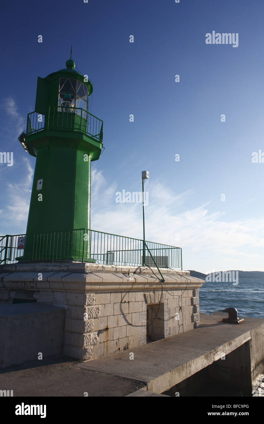 A green lighthouse Stock Photo - Alamy