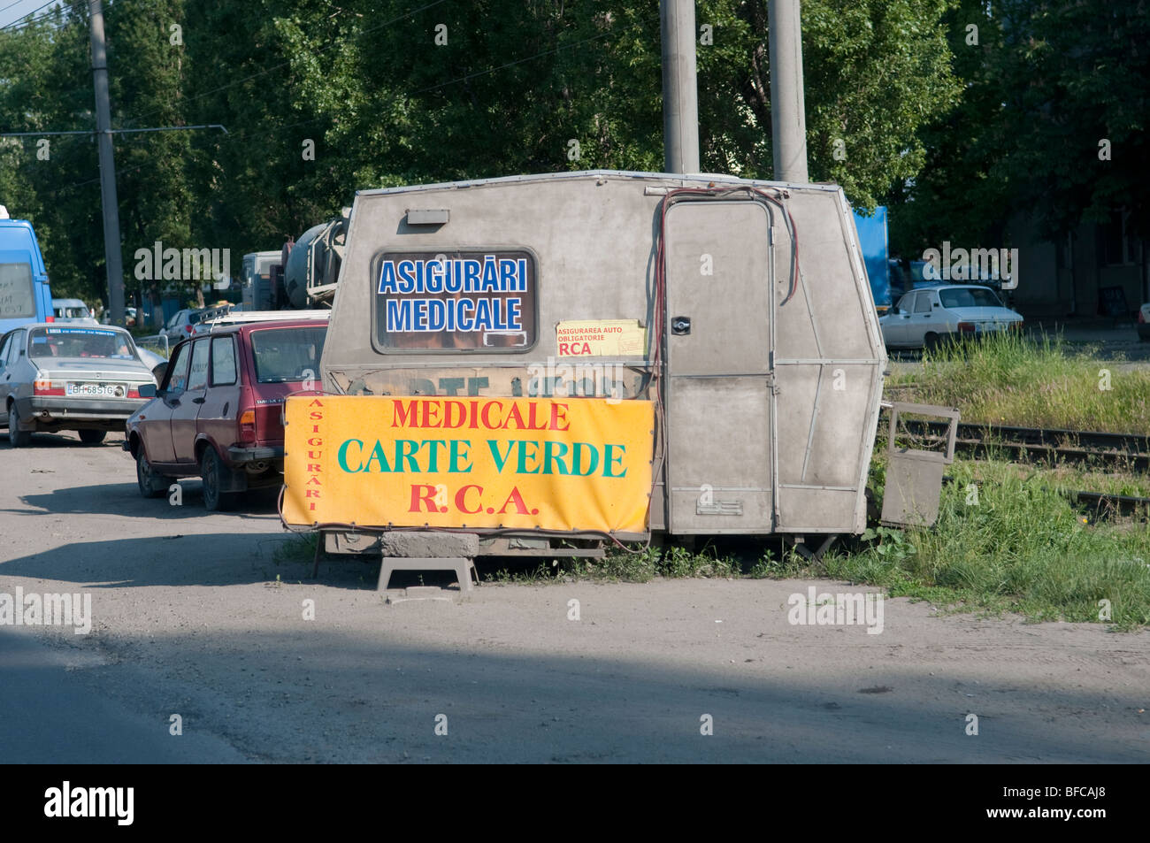 Old caravan being used to sell medical insurance near Ebes Hungary ...