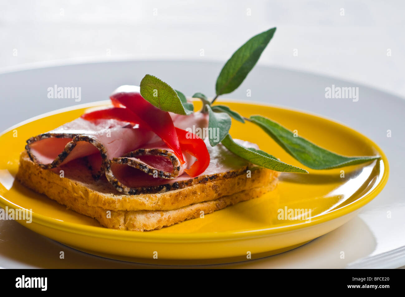 whole wheat toast on a yellow plate Stock Photo - Alamy