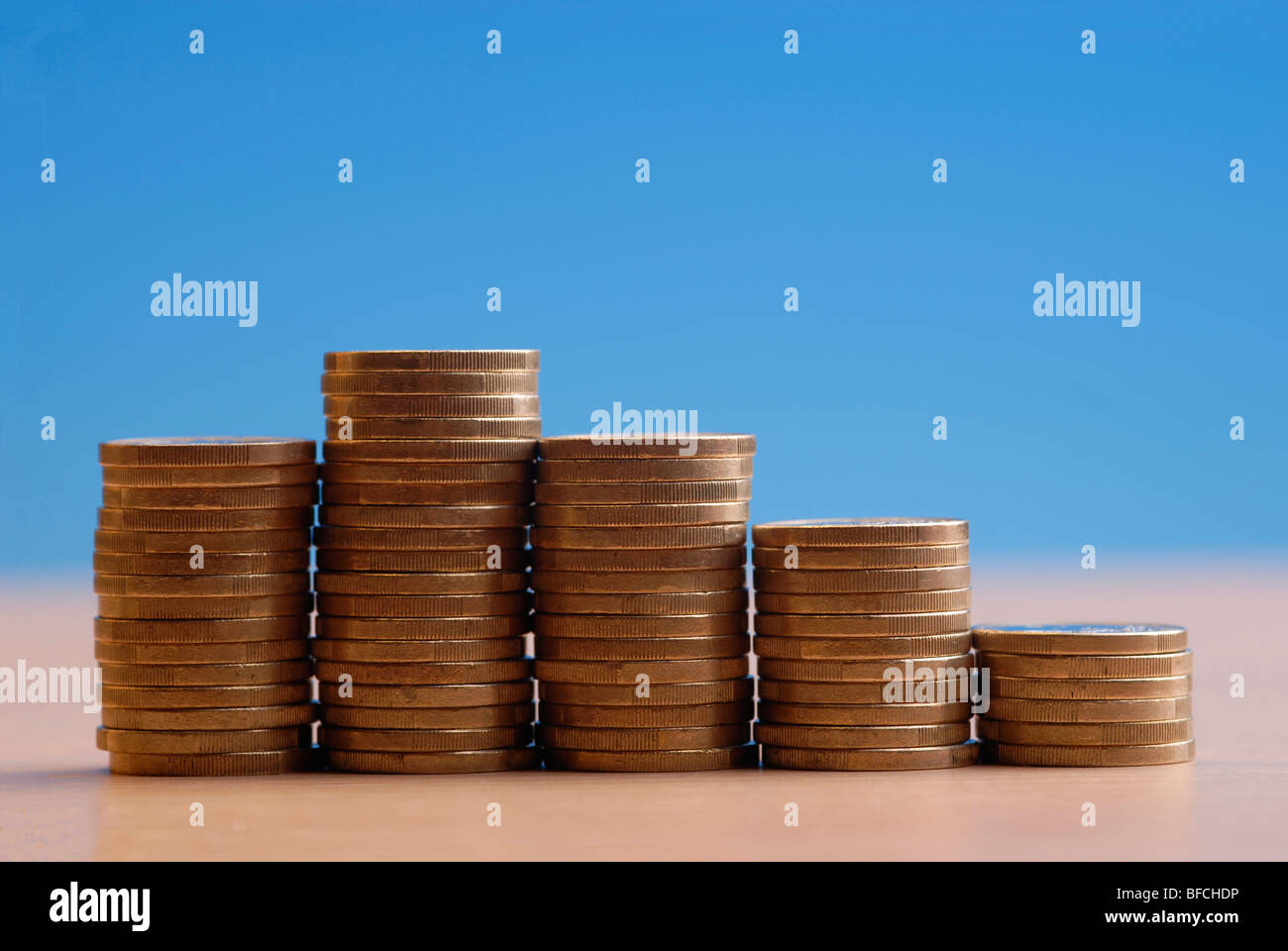 Coin piles hi-res stock photography and images - Alamy
