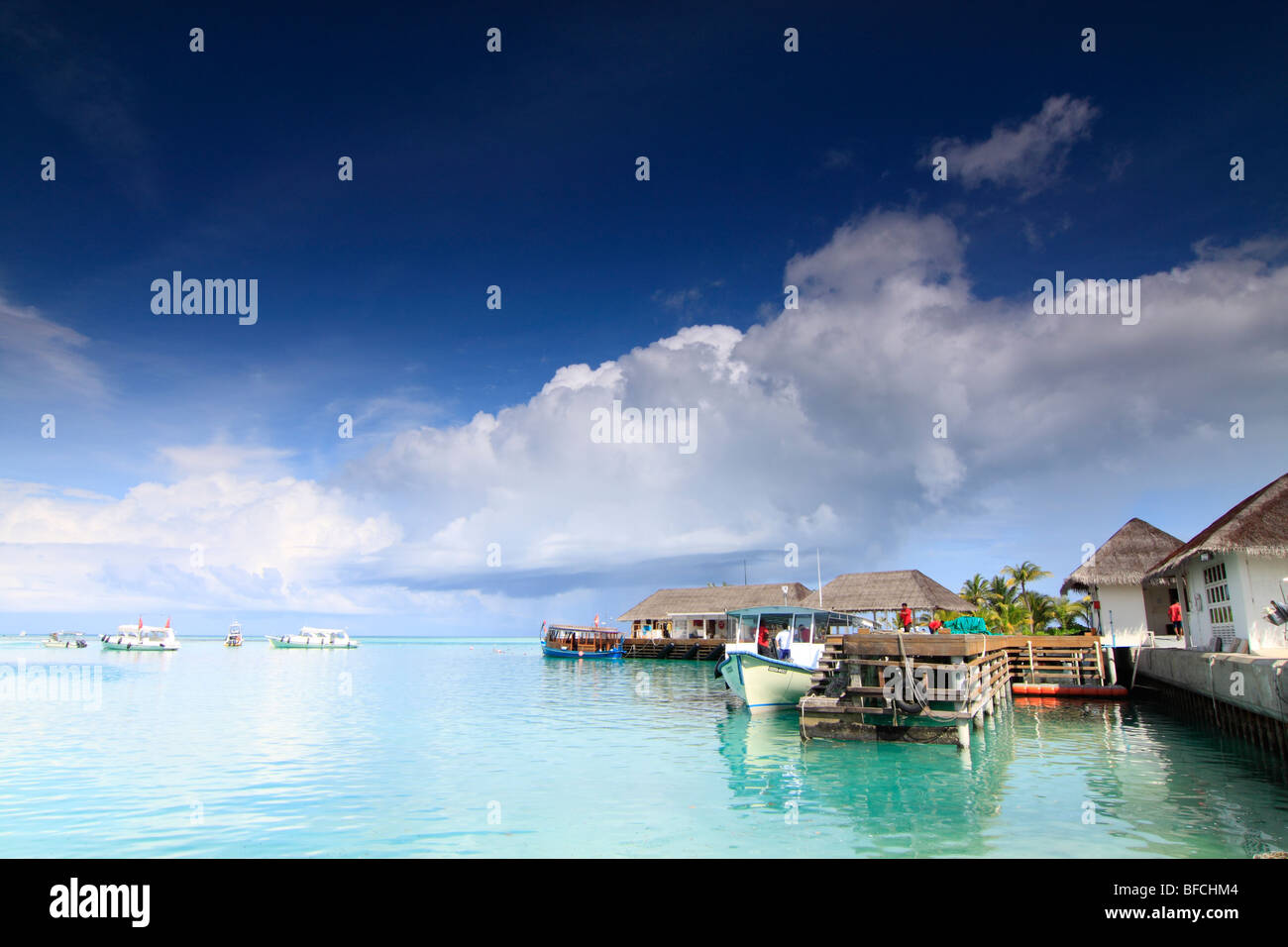 The arrival jetty at Kandooma Resort, Maldives Stock Photo - Alamy