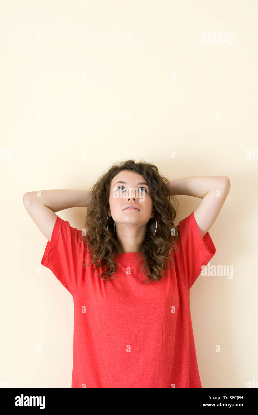Woman arms behind head relax hi-res stock photography and images - Alamy
