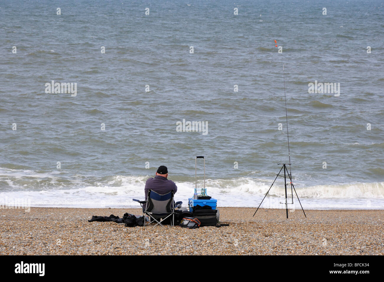 Man sea fishing off beach hi-res stock photography and images - Alamy