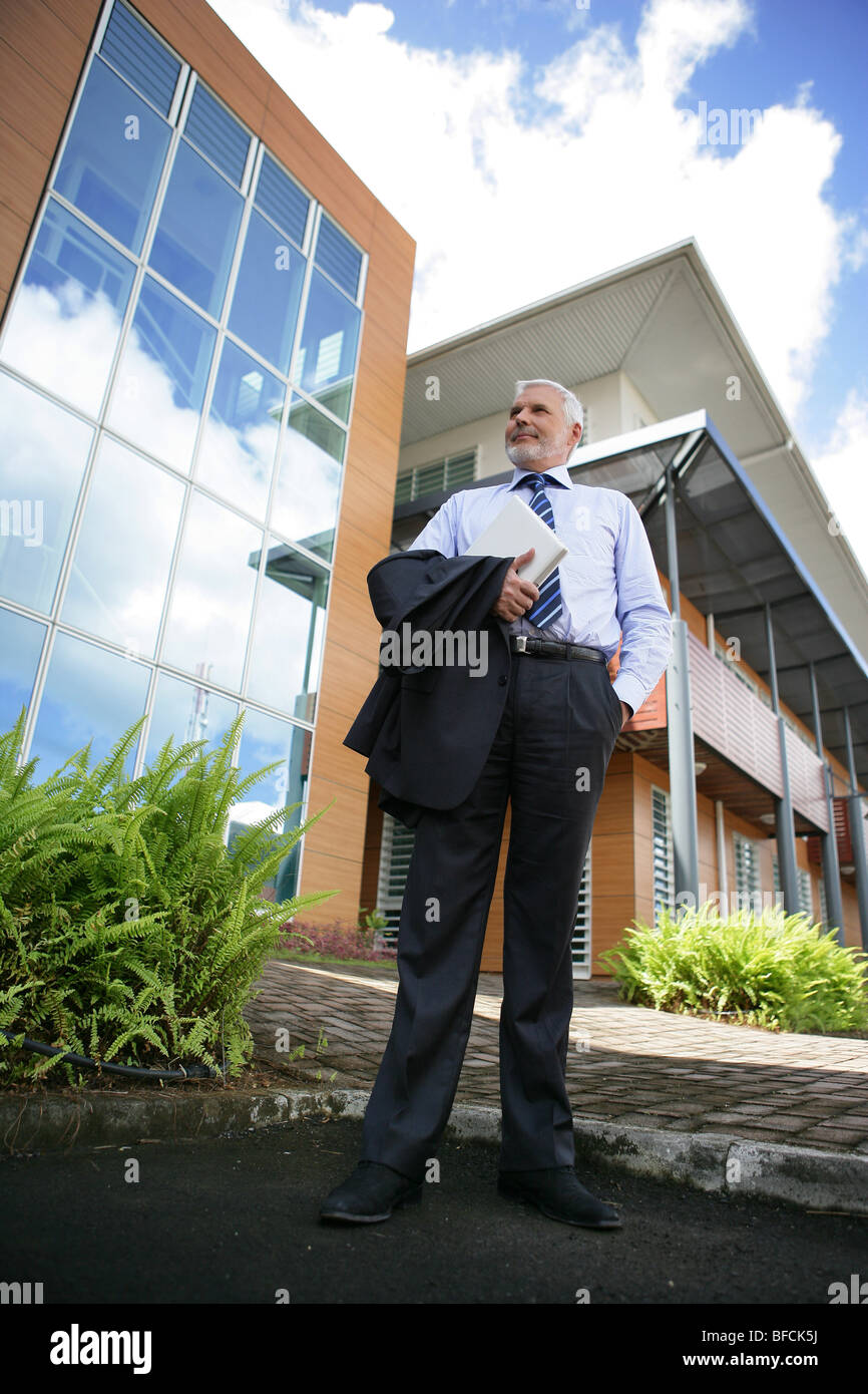 Director standing in front of his company Stock Photo - Alamy